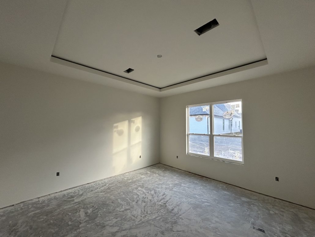 Custom Home Primary Bedroom with a Stepped Ceiling - Ron Lee Homes